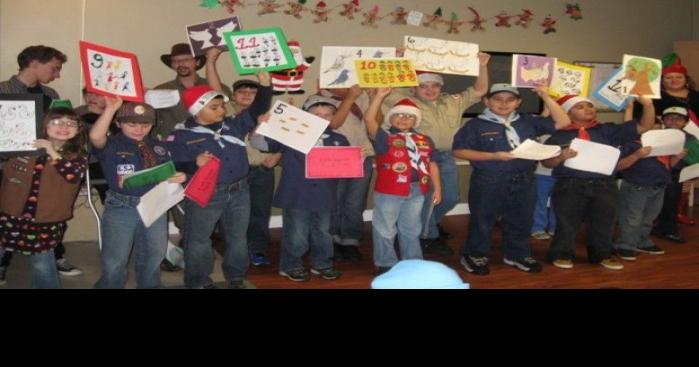 Scouts sing a song for seniors