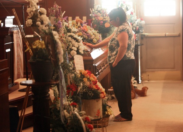 Family, friends, strangers reach out during funeral service for slain ...