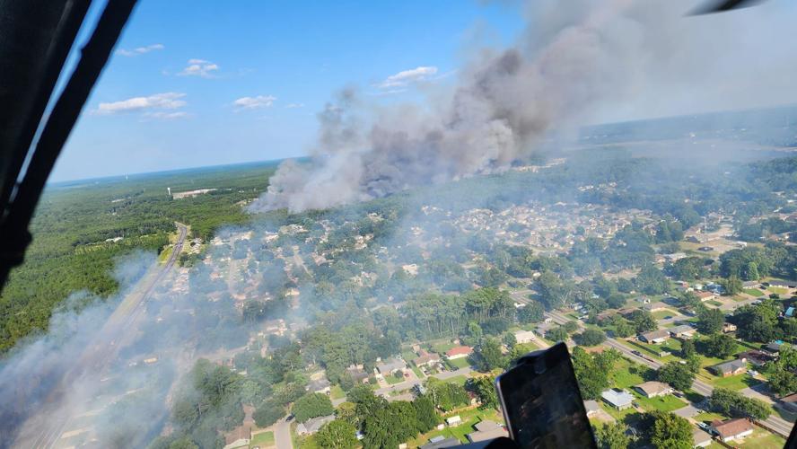 Aftermath Surreal from Onslaught of County Fires; Locals Help Each ...