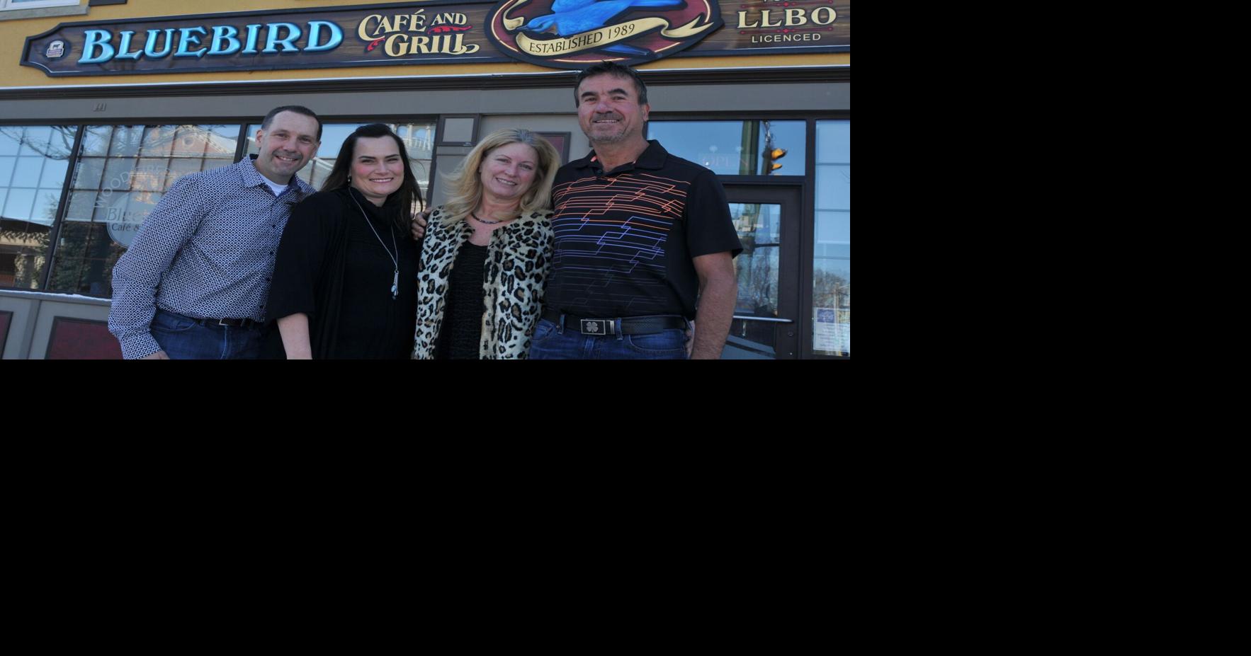 Restaurateurs passing Bluebird Café and Grill keys, menu, recipes onto ...