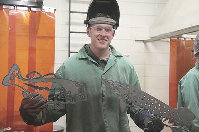 Petal metal: Students craft flowerpot art from steel | News ...