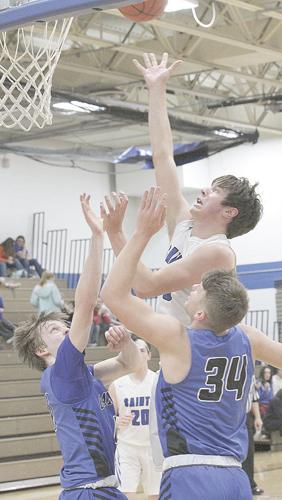 Saints boys hoops win fourth straight conference game | Sports ...