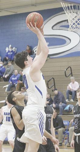 Saints boys basketball defeats Barron | Sports | osceolasun.com