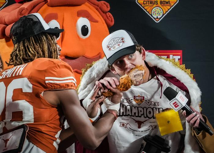 Arch Manning runs and passes Texas past Michigan in Citrus Bowl ...