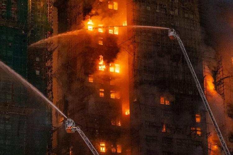 Photos from Hong Kong's deadliest fire in decades | National News | oskaloosa.com