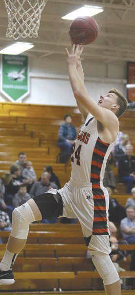 Five in double digits helps Trojans stop M-D | Knoxville | oskaloosa.com