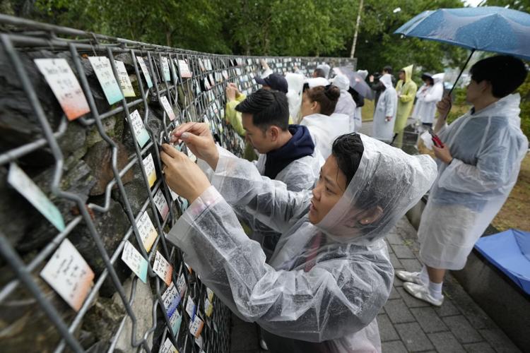 A wall of nametags at a South Korean park testifies to adoptees ...