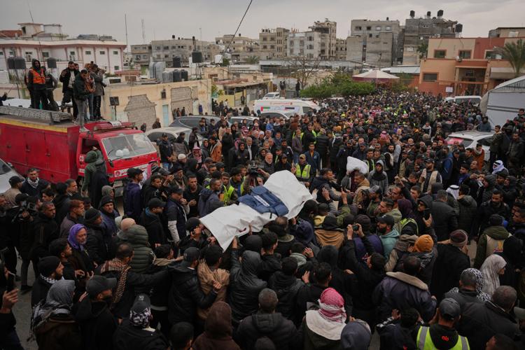 People in Gaza dig through garbage for things to burn to keep warm — a ...