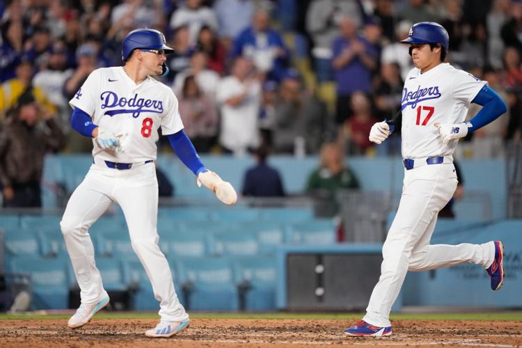 Dodgers' Shohei Ohtani hit on the hand by a pitch, exits game against ...