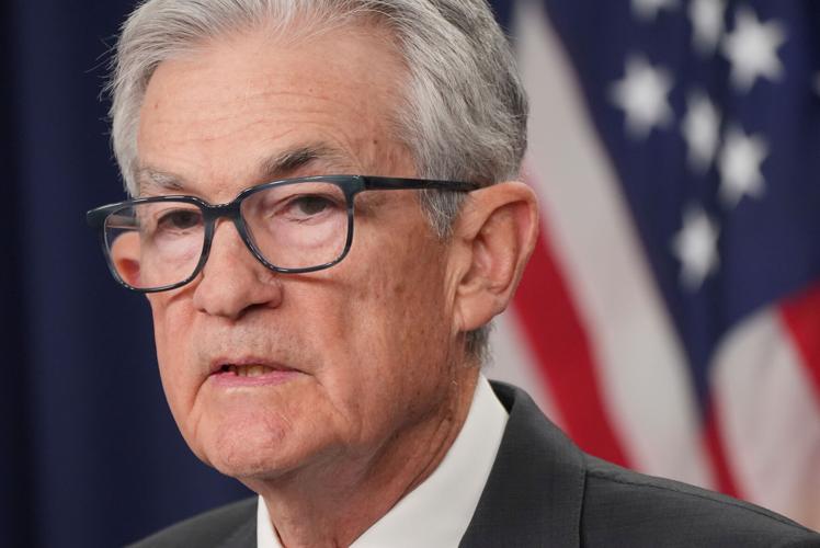Federal Reserve cuts key rate, sees healthier economy next year ...