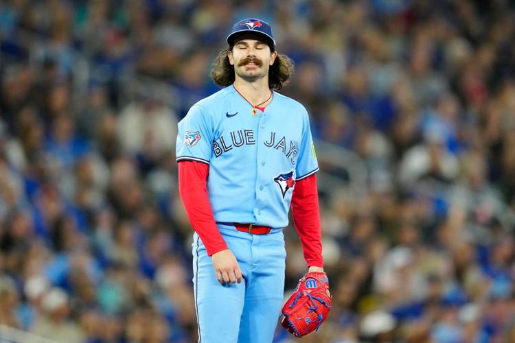 Blue Jays' Dylan Cease and Vladimir Guerrero Jr. leave the game against ...