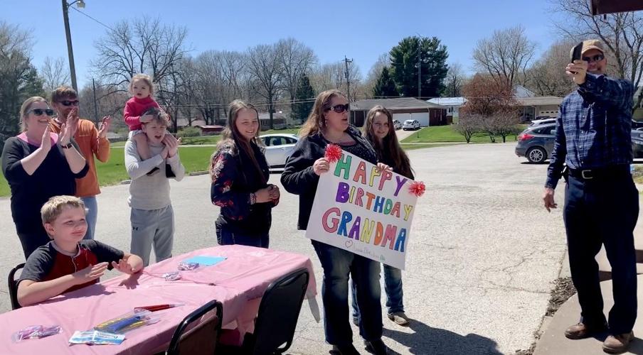 Family gathers outside of White Oaks Estates to celebrate relatives ...