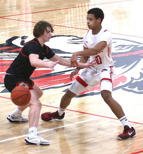 Boys basketball: Big Reds hold off Trojans heading into break | Sports ...
