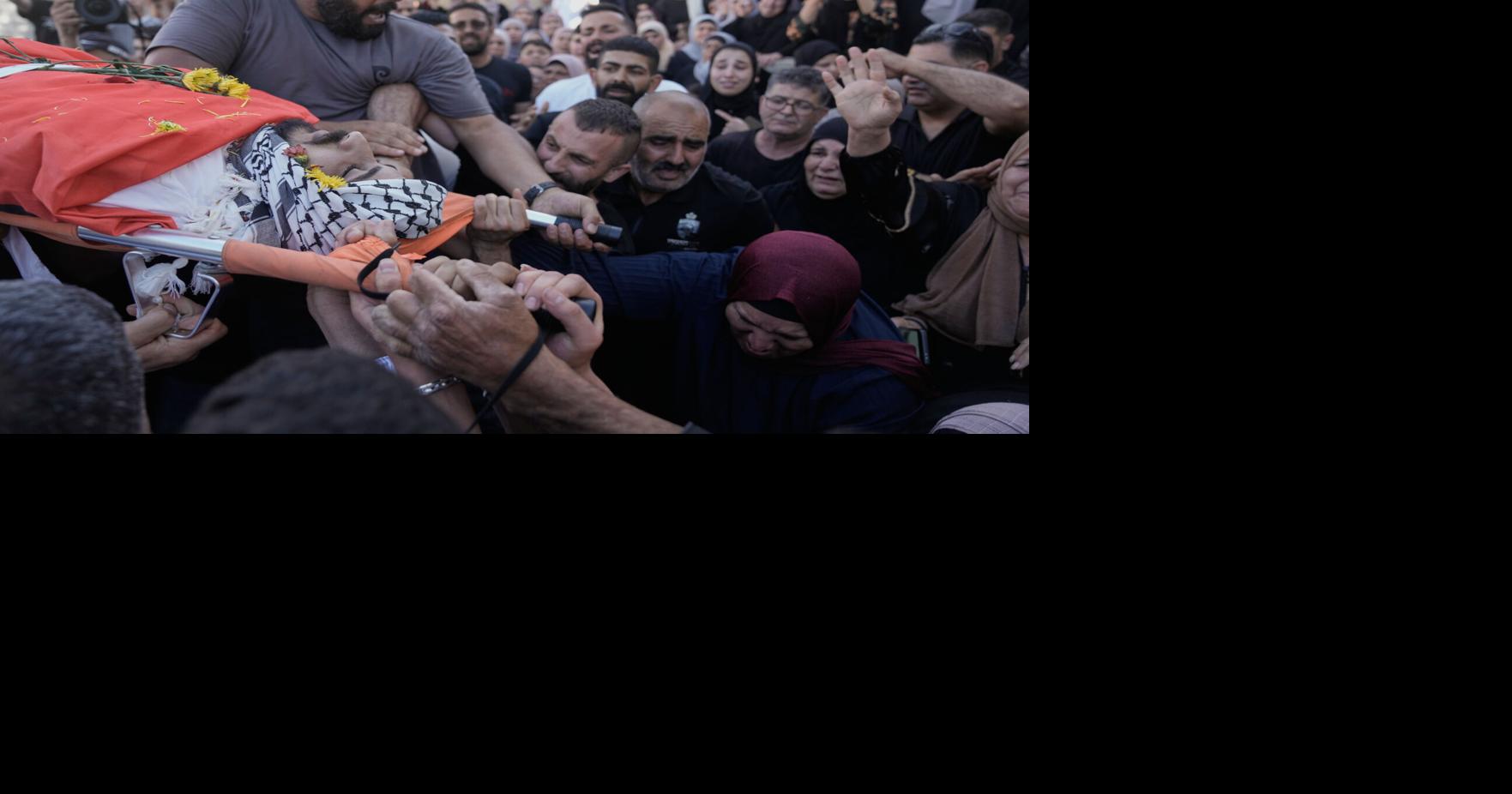 Palestinian man is shot and killed at a West Bank barrier near ...