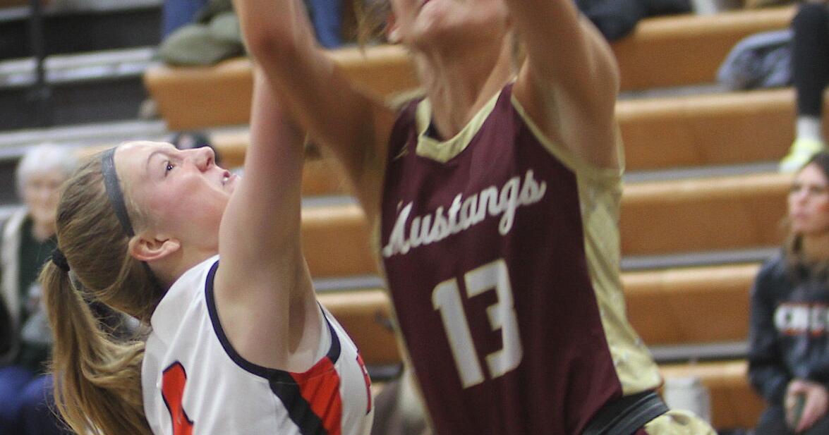 Girls basketball: Late free throw lifts Mustangs past Trojans | Sports ...