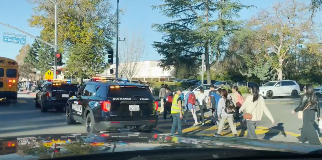 Police Officers Safely Escort Students Across Campuses | San Marino ...