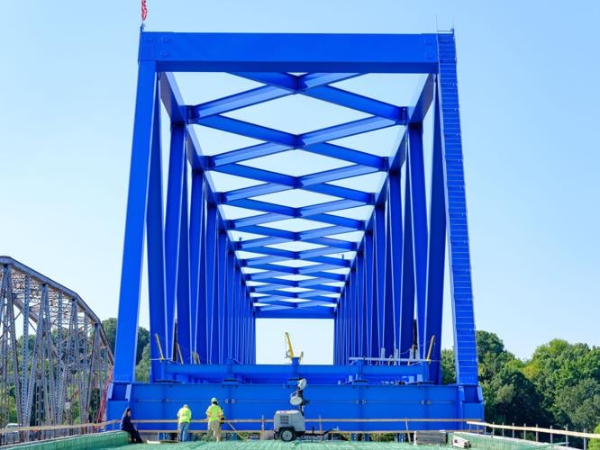 Water Under the Bridge: New Truss Installed Following Float Up River ...