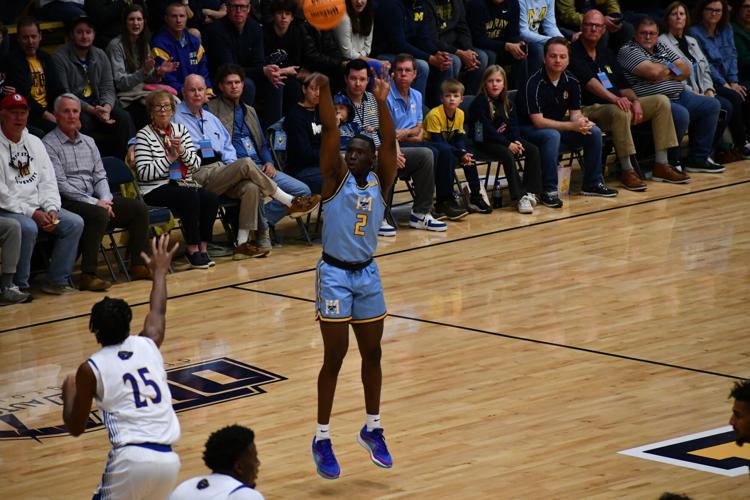 Racers go back to basketball roots with exhibition win at Racer Arena ...