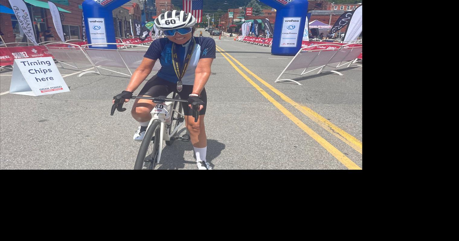 Cyclist and breast cancer survivor completes marathon two months after ...