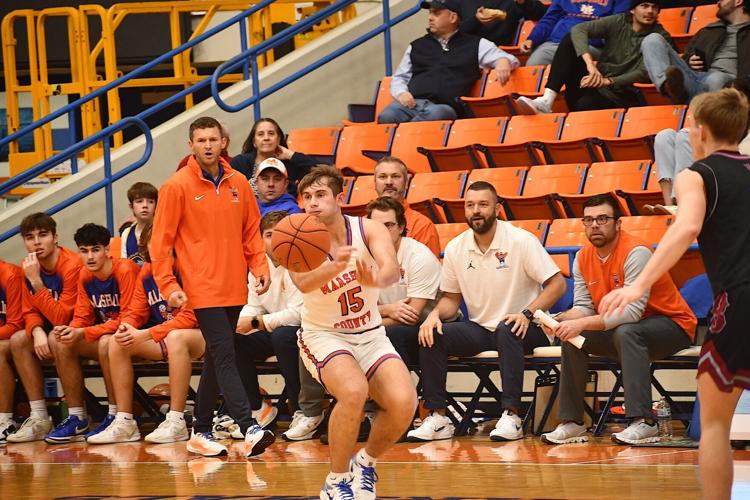 Langhi's 30 propels Marshall past Bruins | Sports | paducahsun.com