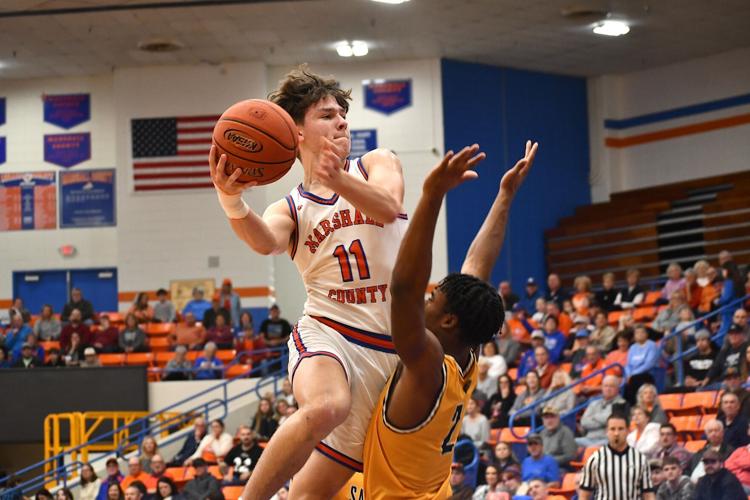 Marshall remains flawless with Holiday Classic championship win ...