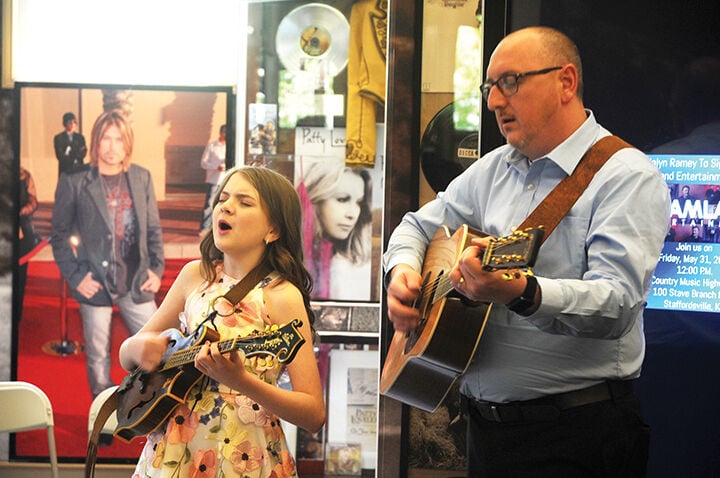 Singing and signing: Local artist signs record contract | News ...