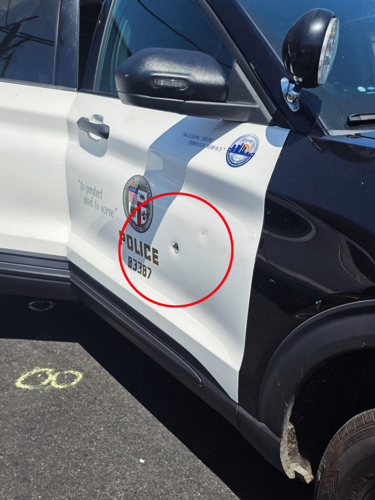 Cop shot in chest during gun battle saved by bulletproof vest ...
