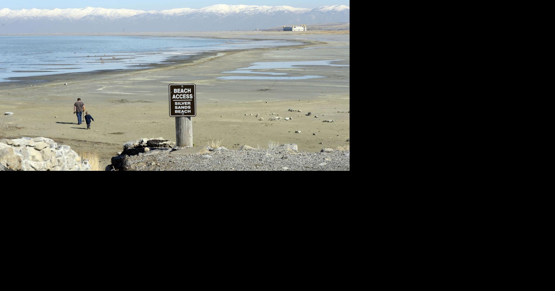 Beached boats, pink water as drought saps Great Salt Lake