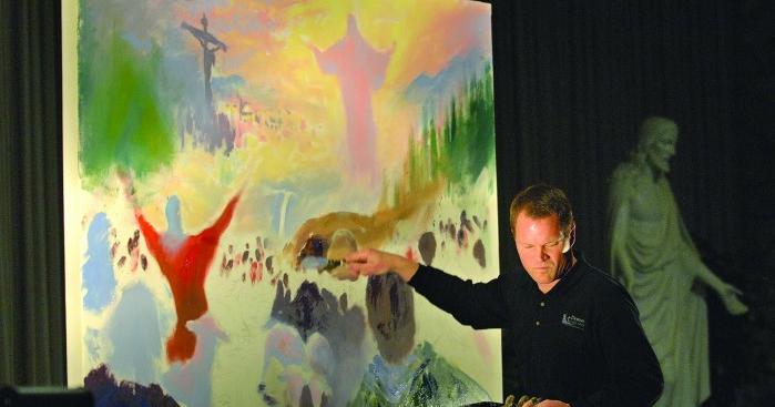 Drawn to God & art: Minister paints mural at Bloomington church