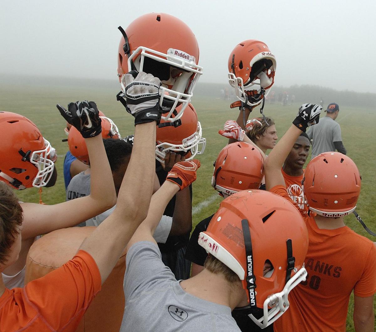 Photos: Opening day of high school football practice
