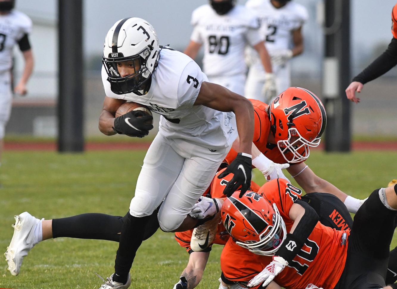 Olympia's Ethan Davis runs wild, continues year of senior milestones