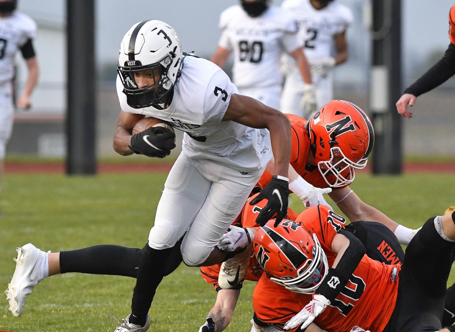 Olympia's Ethan Davis runs wild, continues year of senior milestones