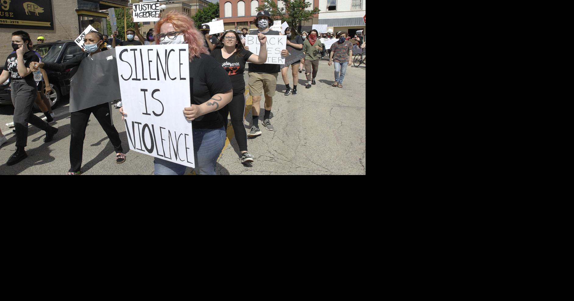 Protesters gather at McLean County Law and Justice Center