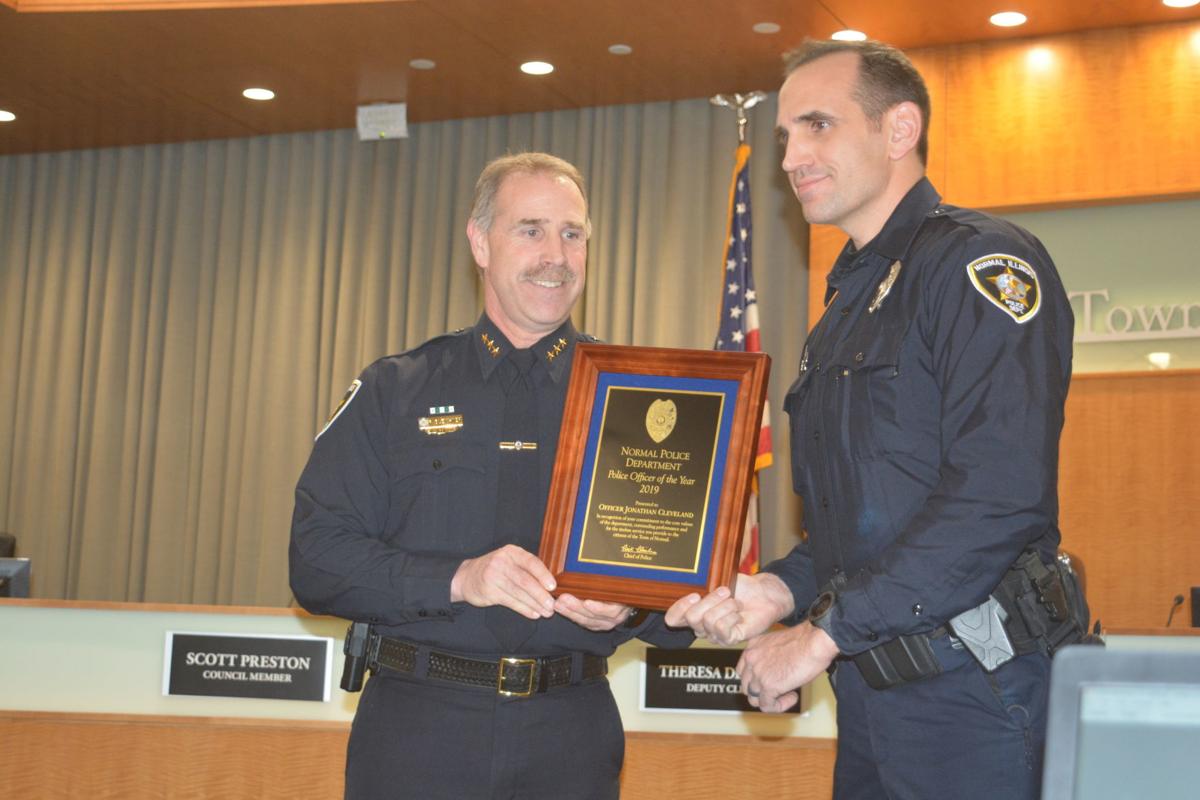 Veteran police officer honored during Normal City Council meeting