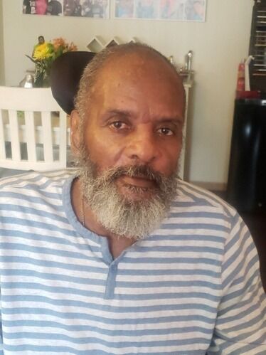 Reginald E. "Reggie" Curry