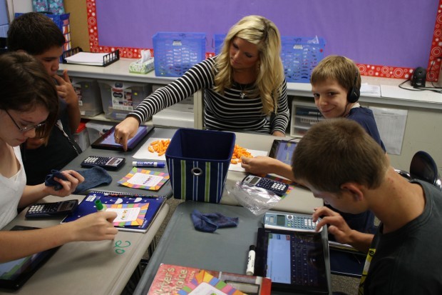 * FULL STORY * Middle school math classes go digital