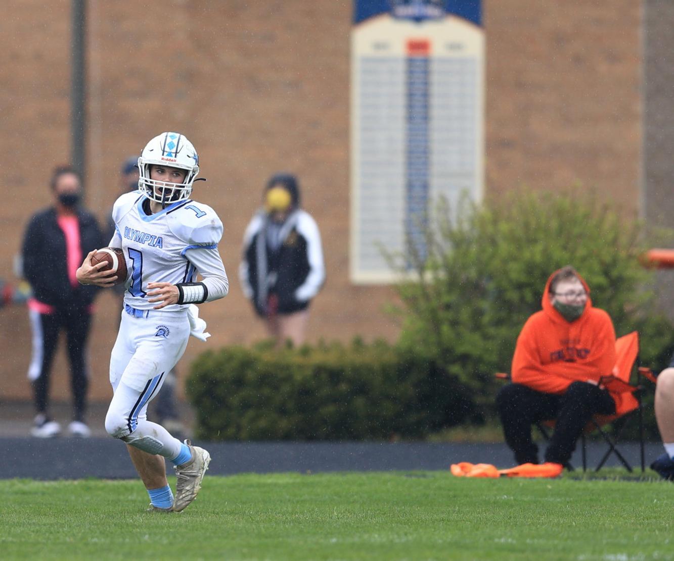 Olympia's Ethan Davis runs wild, continues year of senior milestones