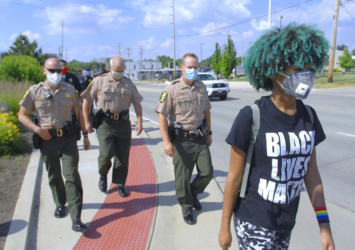 Watch now: In Normal, police take to the streets with message against ...