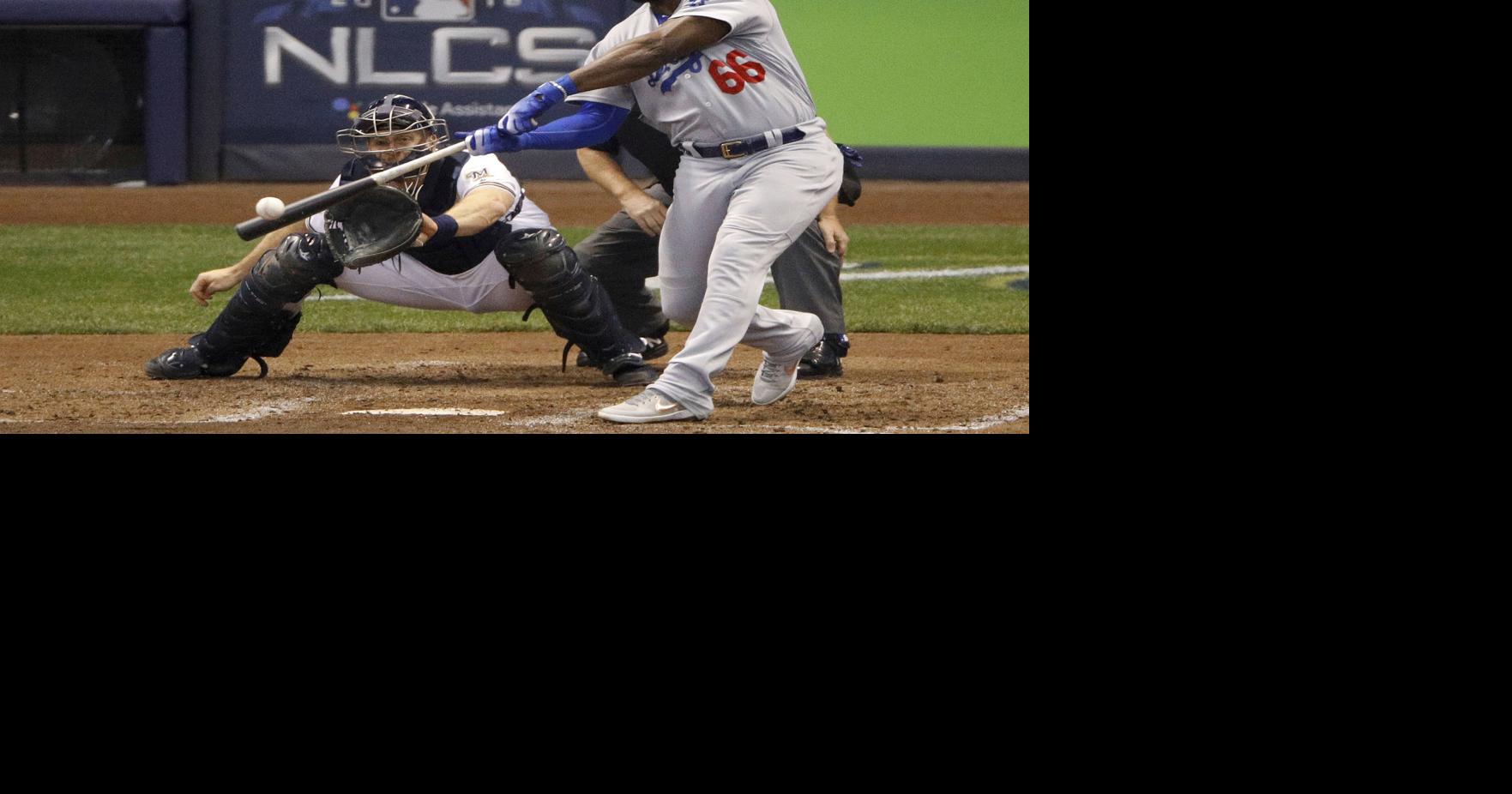 Dodgers send Puig, Kemp, Wood to Reds for Homer Bailey