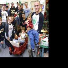 Fraternity shows kids meaning of 'brotherhood'