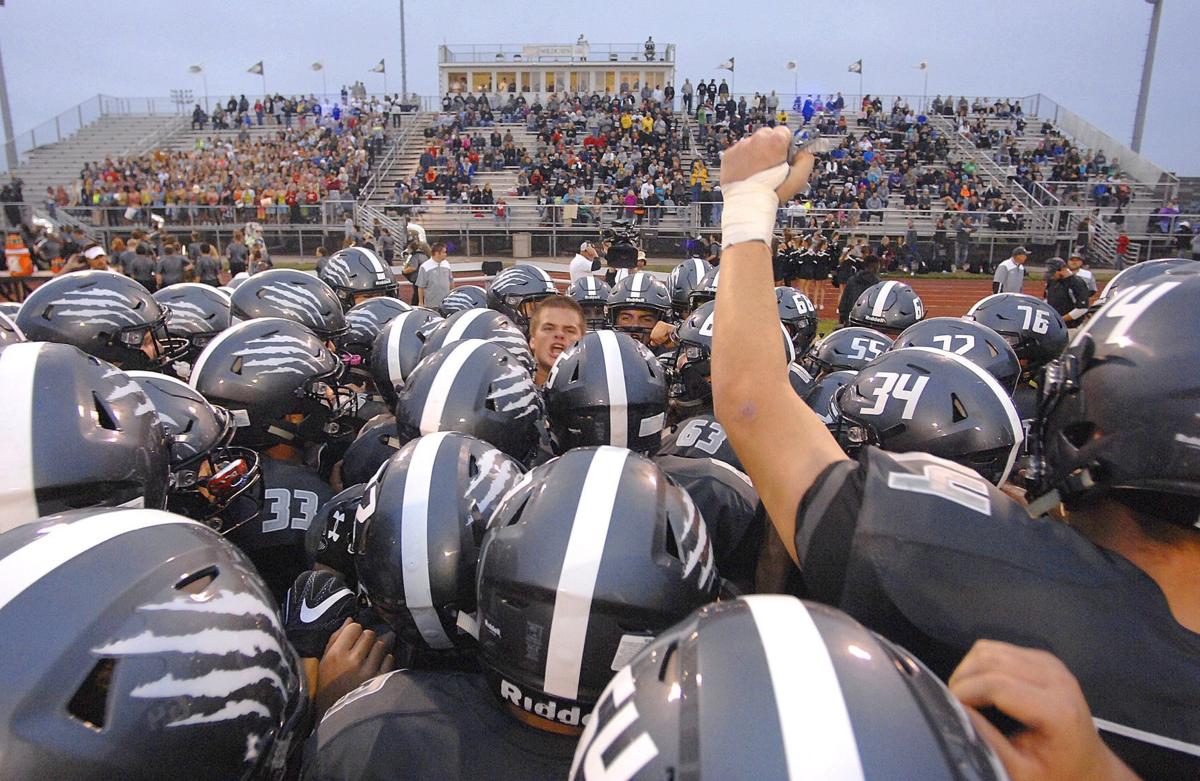 Photos: Normal West football defeats Peoria Notre Dame on opening night