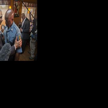 Holder says he understands mistrust of police