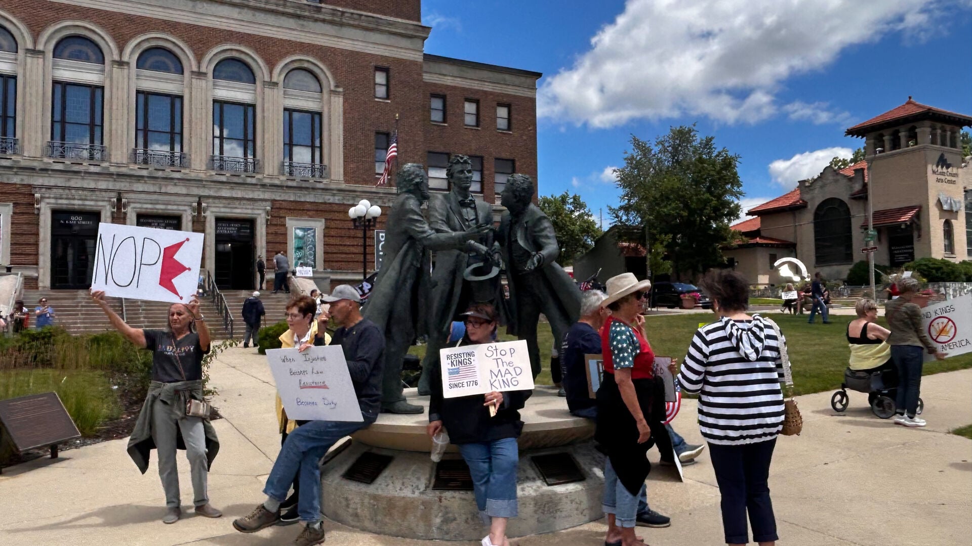 Nearly 500 attend Bloomington No Kings rally