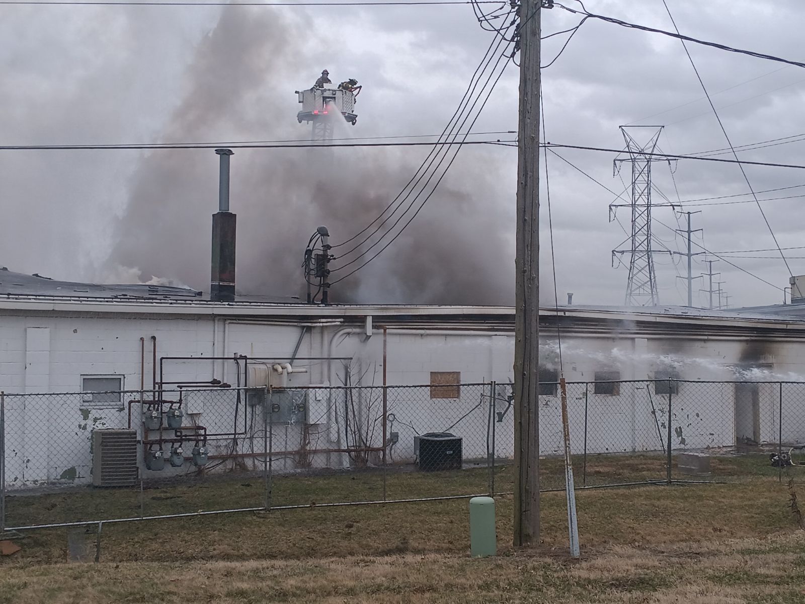 Bloomington crews return to reignited structure fire on Lafayette Street