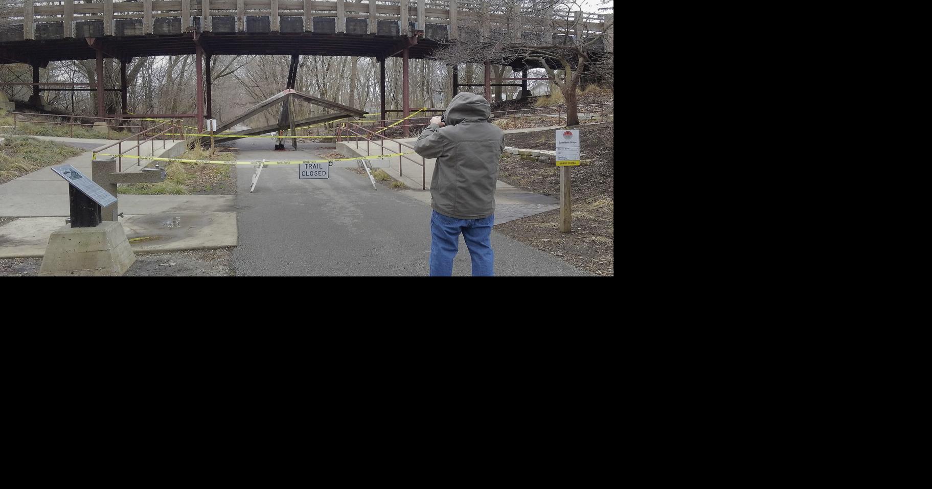 Photos: Timbers collapse off the side of Camelback Bridge