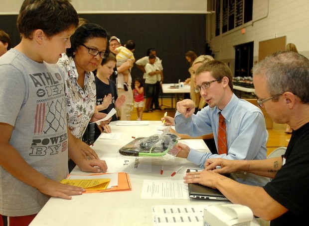 Unit 5 sixth graders receive their laptop computers
