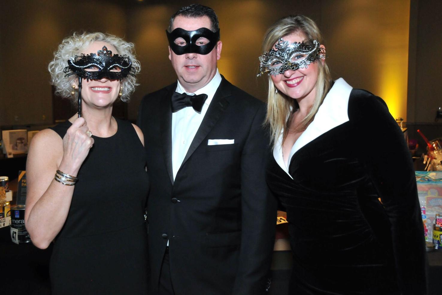 Behind the masks: Photos from the Midnight Masquerade Ball