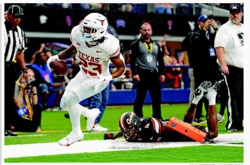 No. 7 Texas bids farewell to Big 12 with title game rout