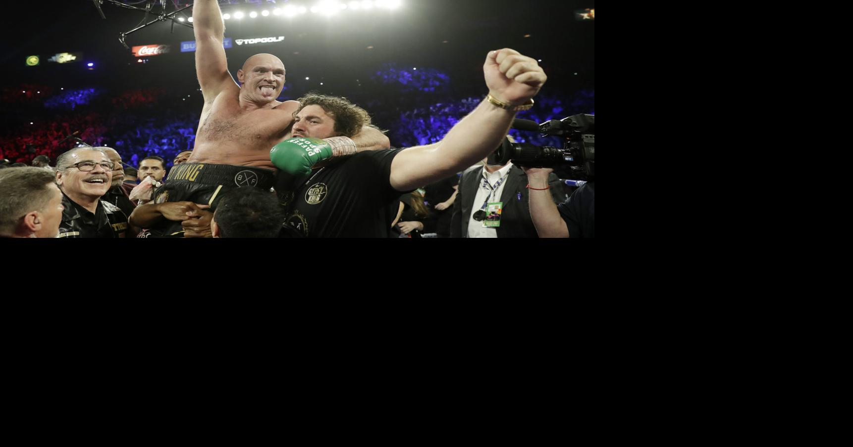 Fury wins in stunning stoppage of Wilder in heavyweight tilt