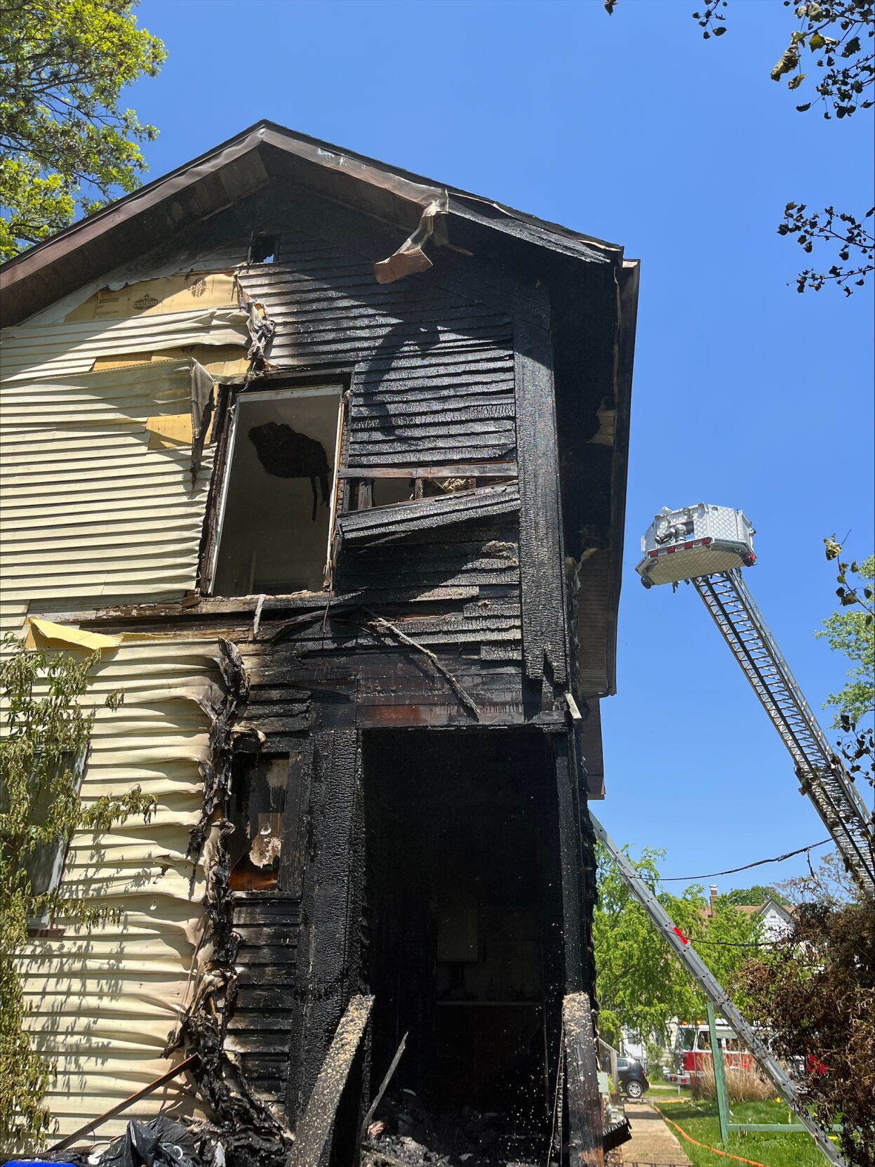 Firefighter treated, 2 residents displaced in Bloomington house fire